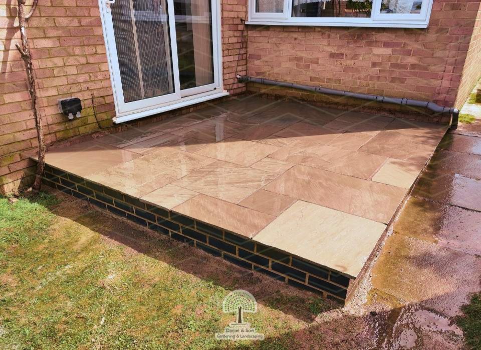 Transformation: From Worn Timber Decking to Elegant Sandstone Paving