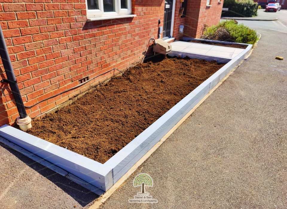 front garden idea - porcelain path levelled with flower-bed